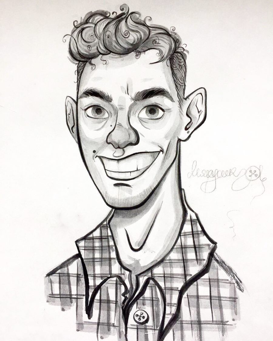 smiling man drawing