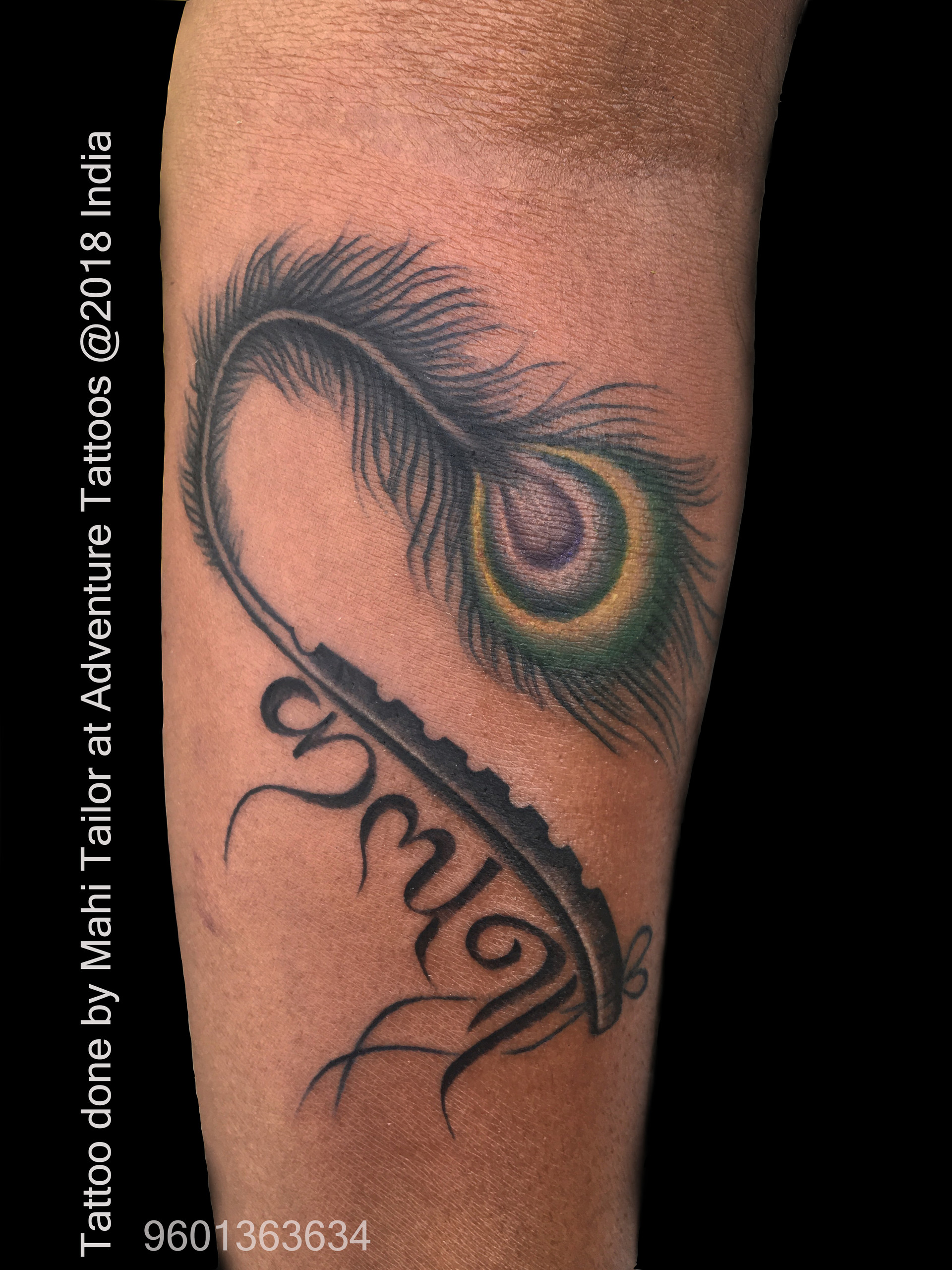 Infinity Symbol With Peacock Feather