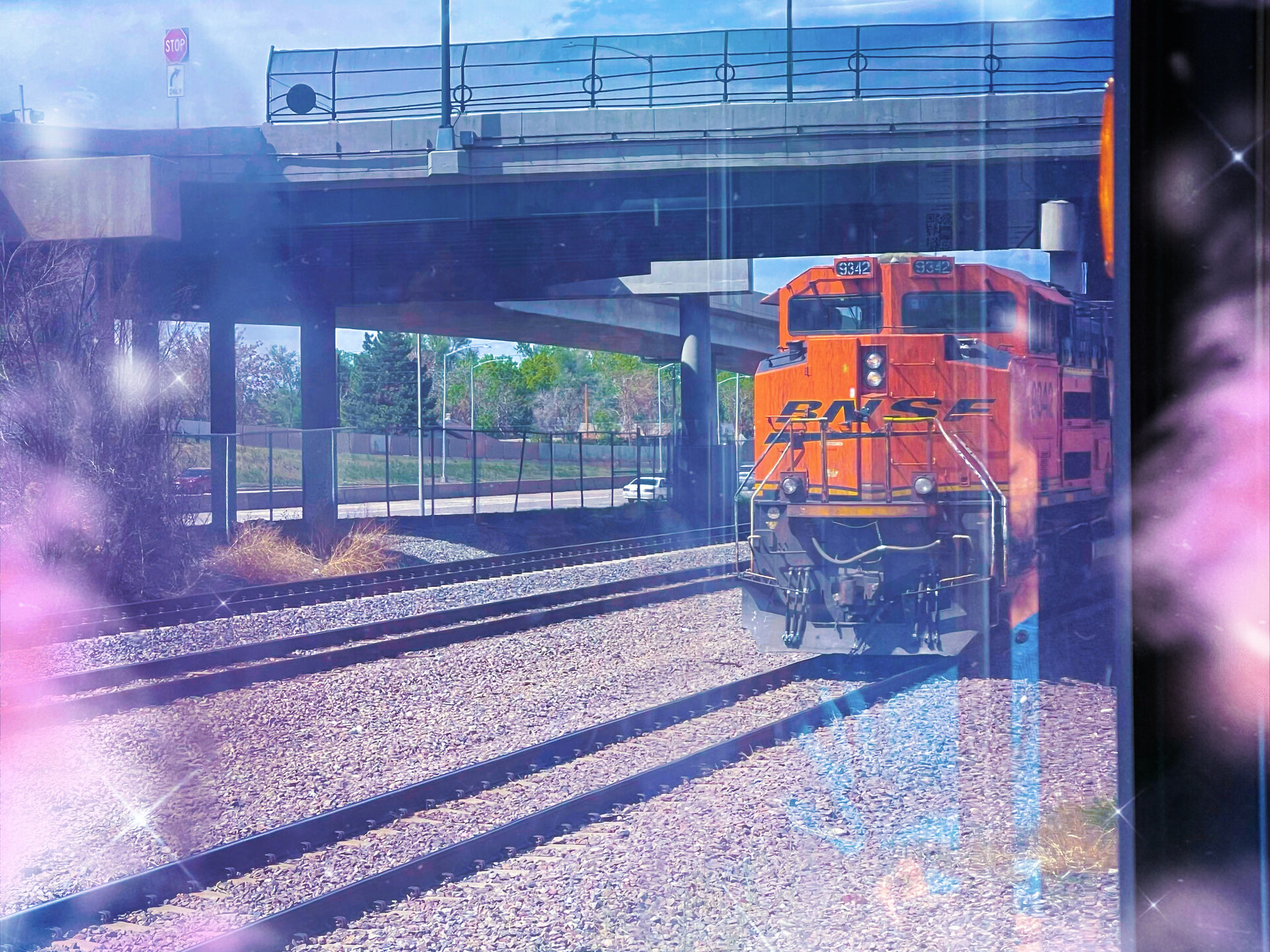 Simon The train guy - BNSF Sd70ace and gevo purple clouds