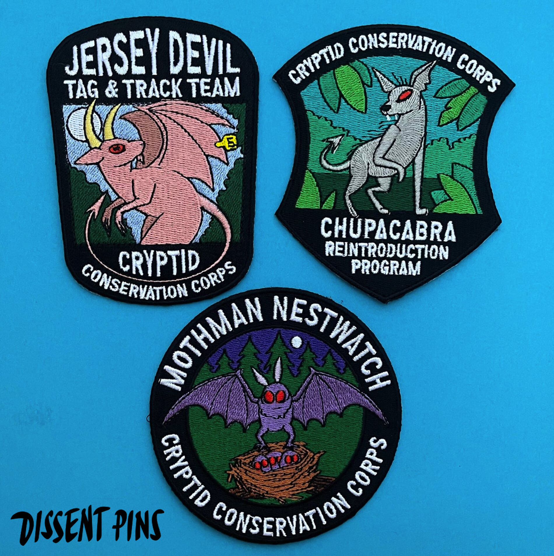 ArtStation - Dissent Pins - Cryptid pins & patches